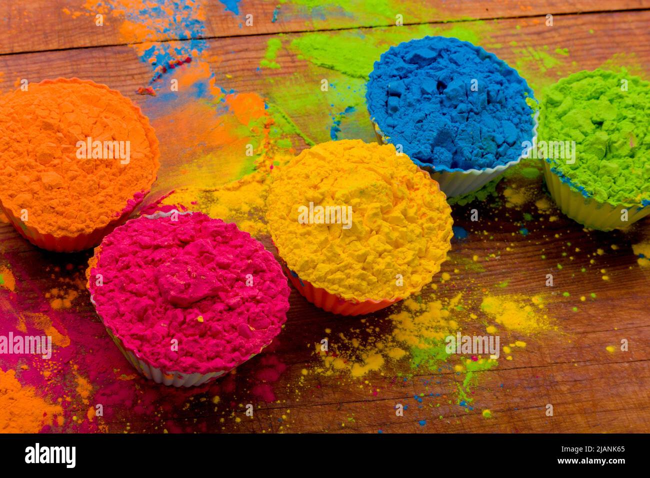 Colorful Holi powder in cups closeup. Bright colours for Indian holi ...