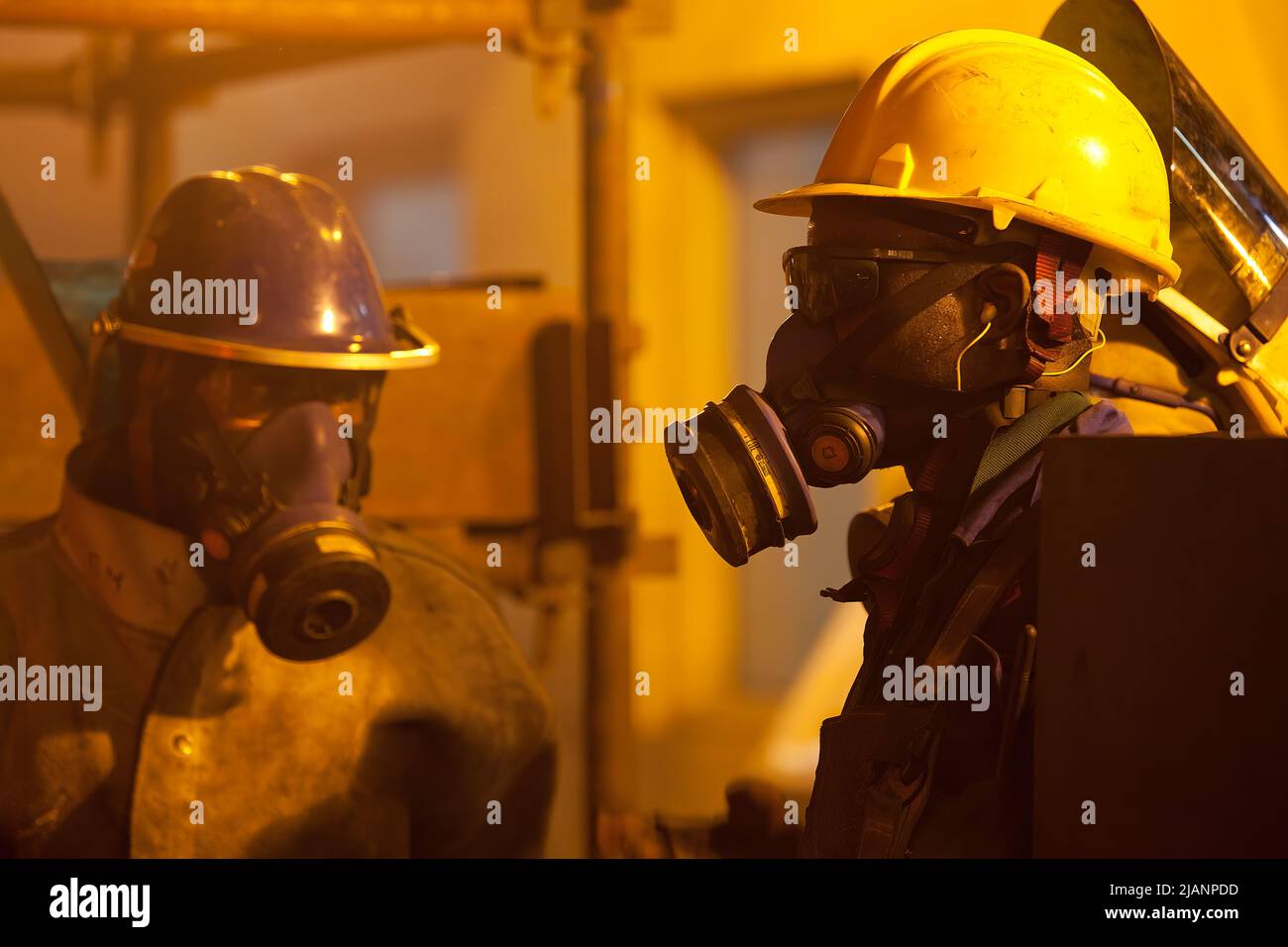 Two employees in protective work gear, First Quantum Minerals copper ...