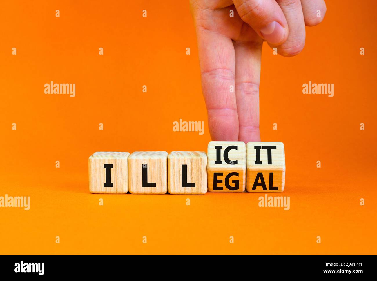 Illegal or illicit symbol. Businessman turns wooden cubes and changes ...