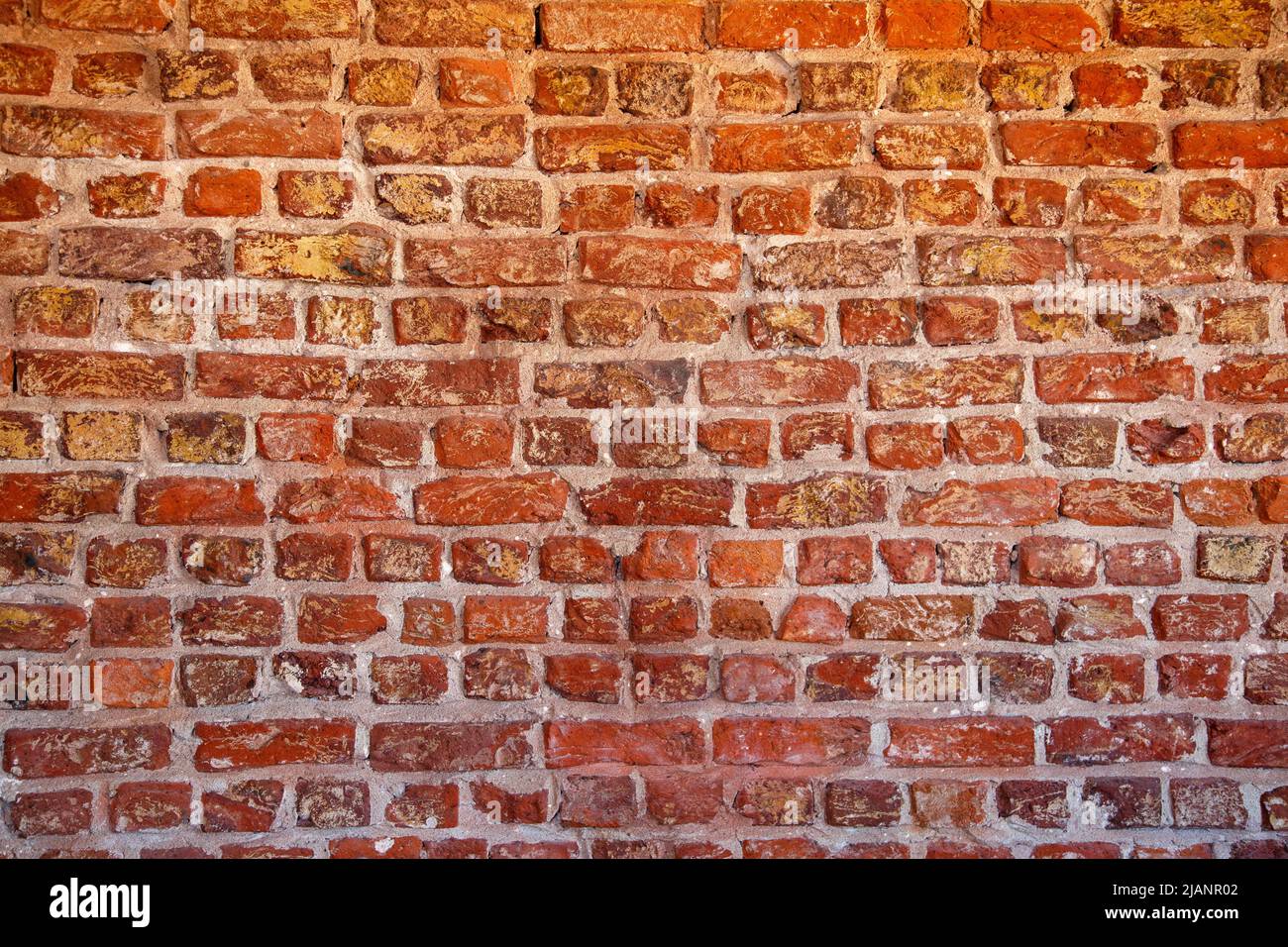 Weathered texture of stained old dark brown and red brick wall ...