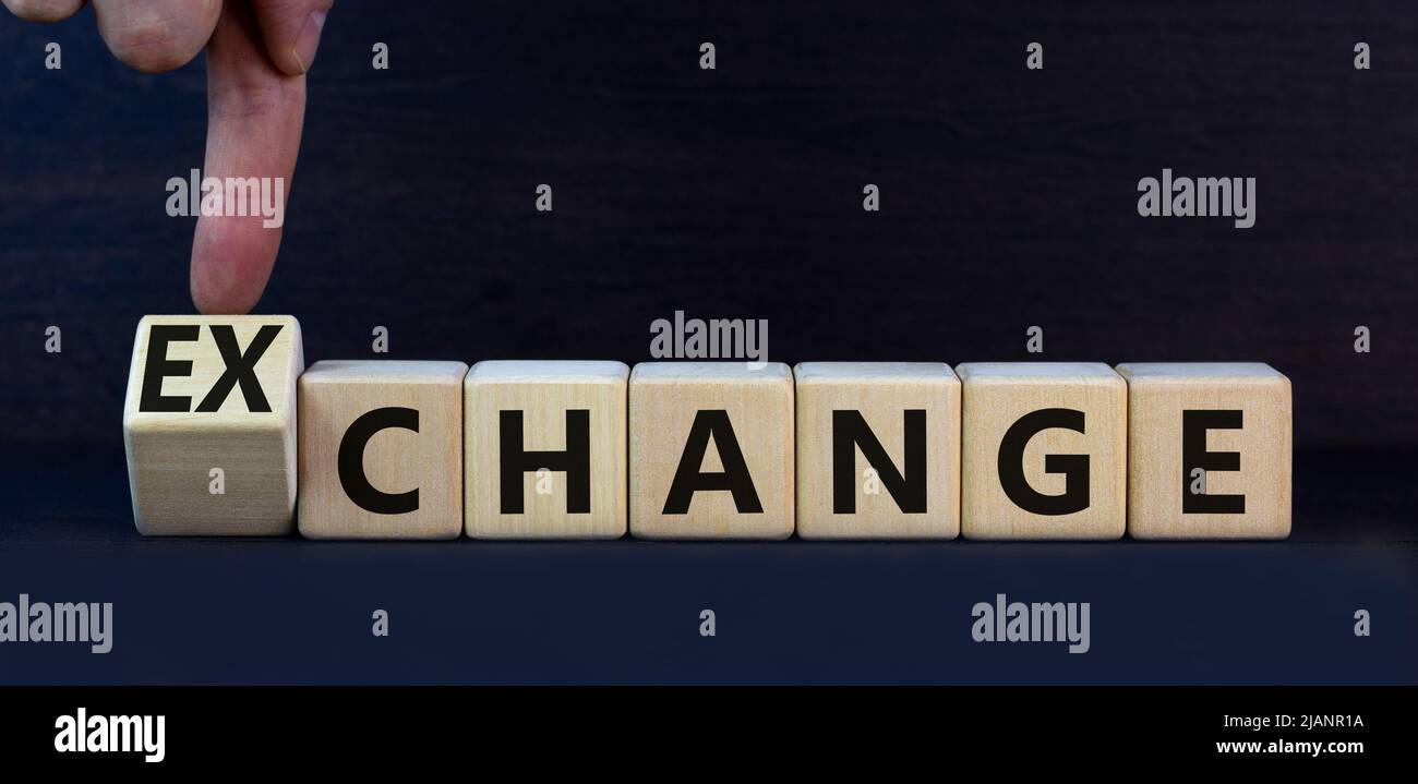 Change or exchange symbol. Turned wooden cubes and changed the concept ...