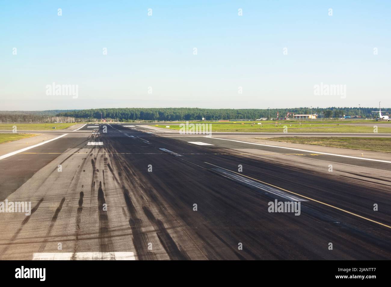 Runway with traces of rubber wheels of the aircraft free for takeoffs ...