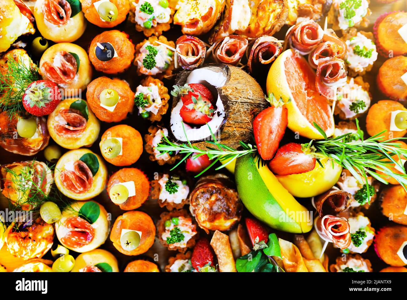 Large group of arranged canape food served Stock Photo - Alamy