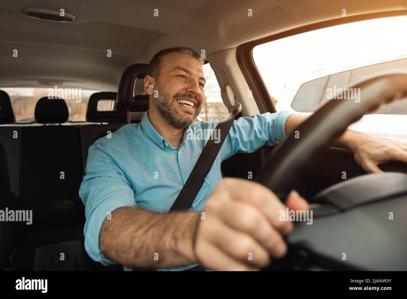 Man enjoying car interior in hi-res stock photography and images - Alamy