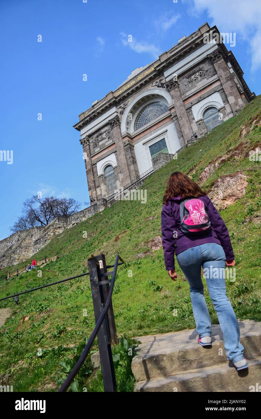 Woman walking up stairs that lead to Esztergom Basilica, seat of ...