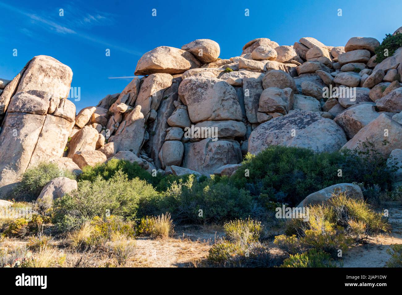 peculiar rock formations of big boulders of rock in Joshua Tree national Park in California on a ...