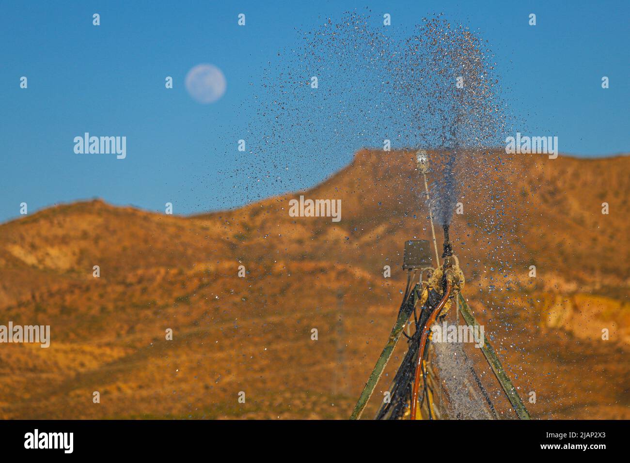Full moon in the east and irrigation system in the fields of Fronteras ...
