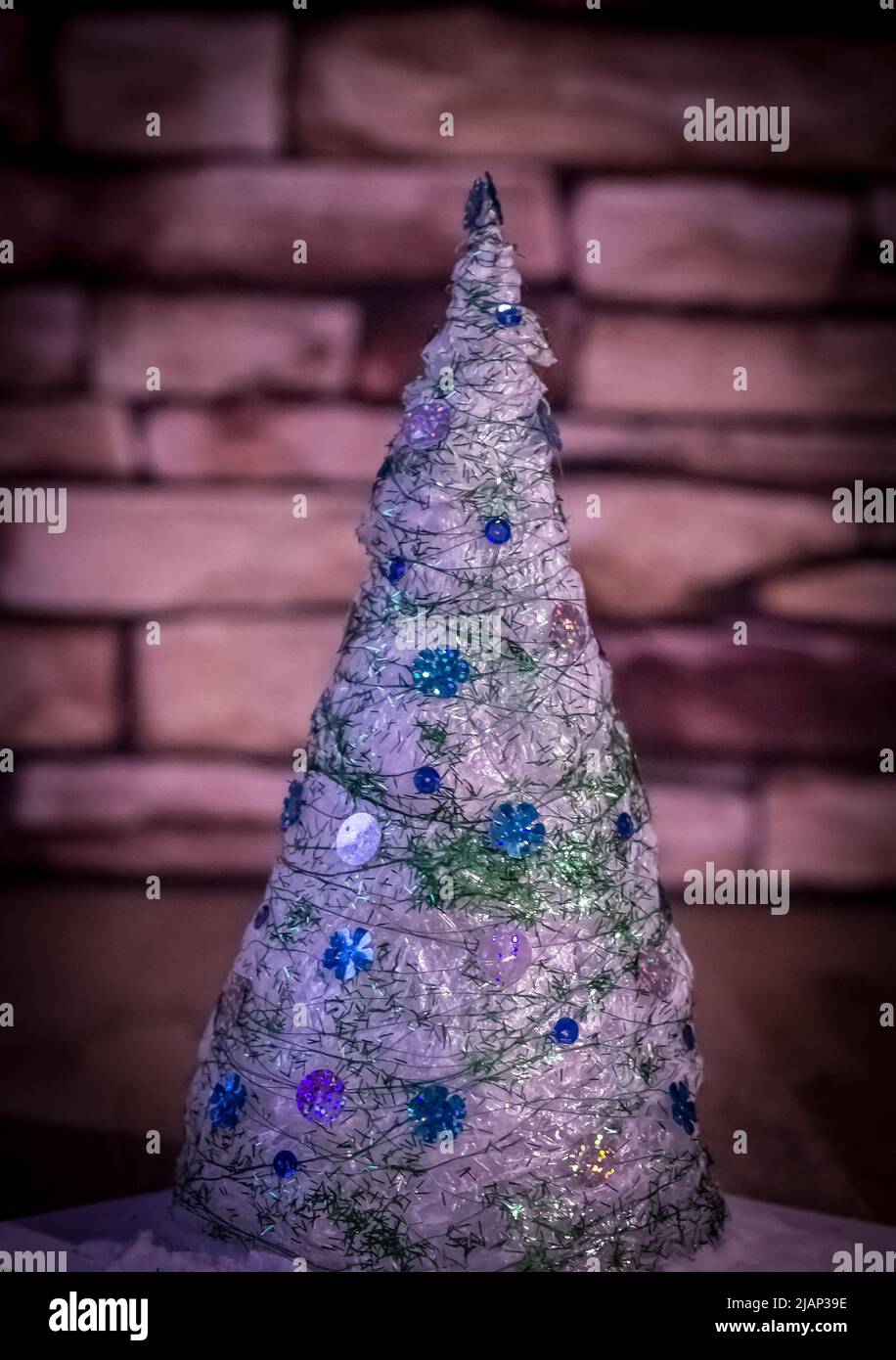 creative Christmas tree on .the brick background Stock Photo - Alamy
