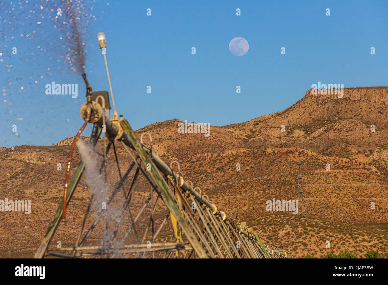 Full moon in the east and irrigation system in the fields of Fronteras ...