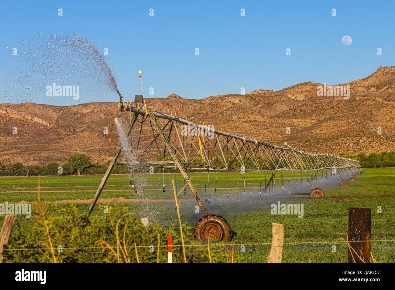 Full moon in the east and irrigation system in the fields of Fronteras ...