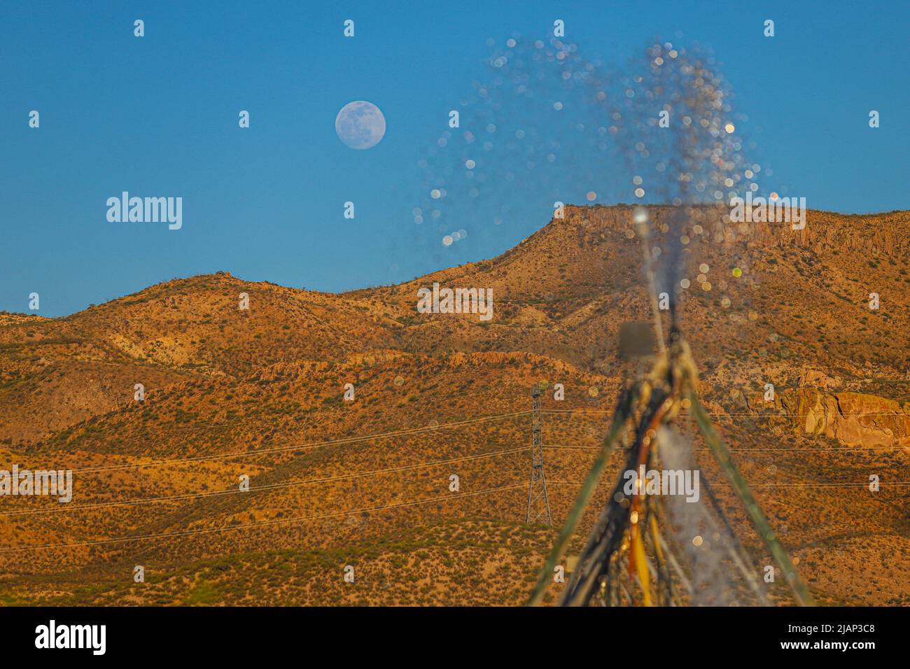 Full moon in the east and irrigation system in the fields of Fronteras ...