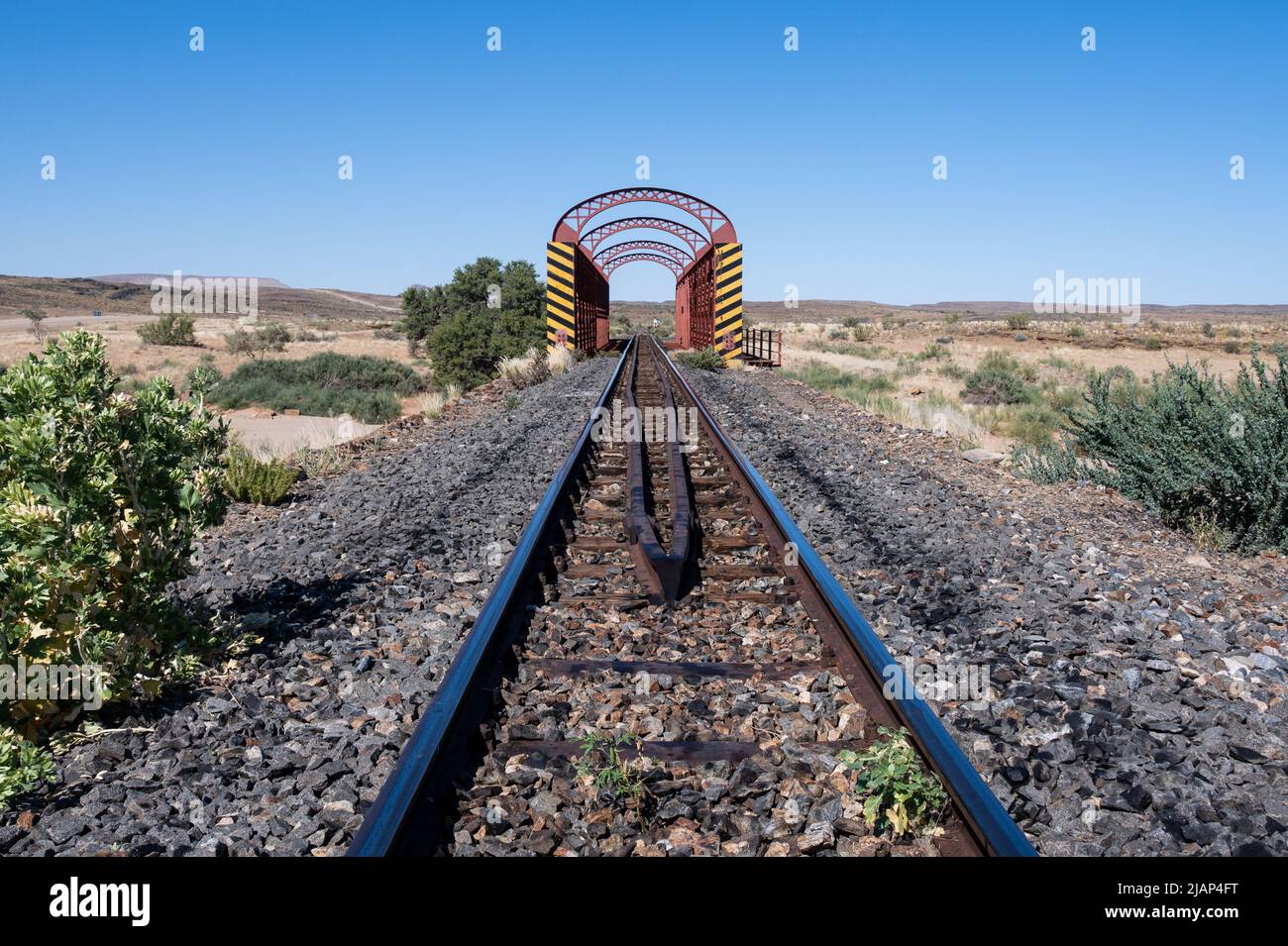 Old rusty railway bridge over dry river near Holoog Namibia Stock Photo ...