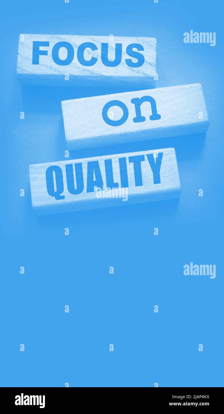 Focus on Quality words of on wooden blocks. Honesty in business concept ...