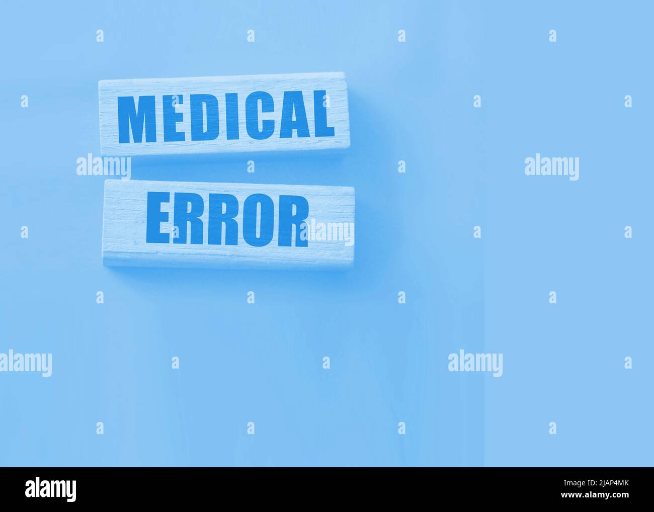 Medical error text on wooden blocks on red. Healthcare concept Stock ...