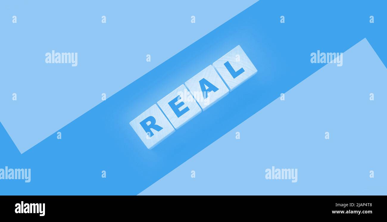 RENT word on wooden cubes on a pink lilac and beige. Real estate ...