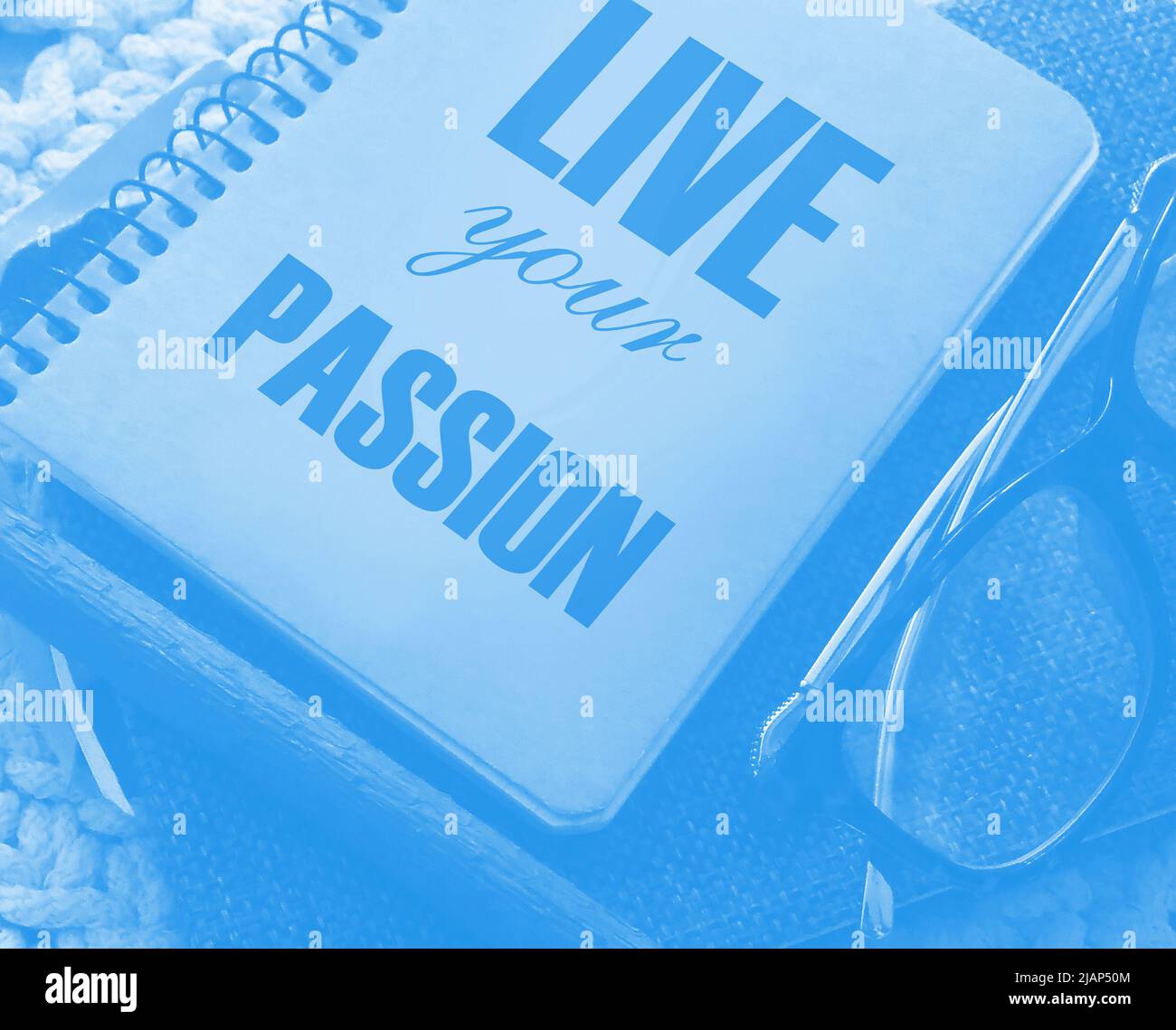 Live your passion on a notebook with glasses and pen. Bsuiness career ...