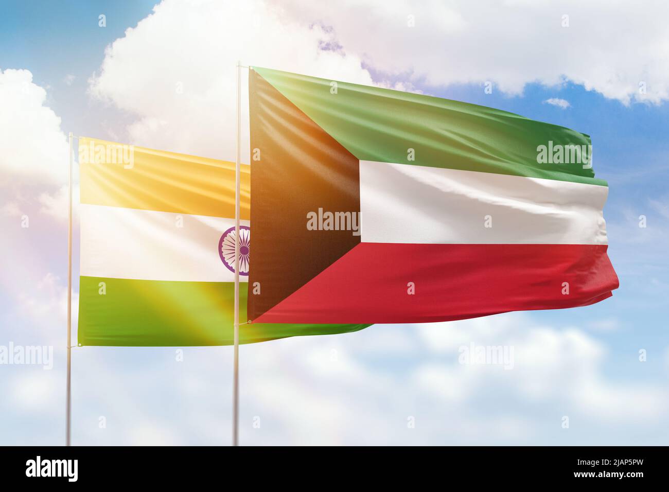 Sunny blue sky and flags of kuwait and india Stock Photo - Alamy