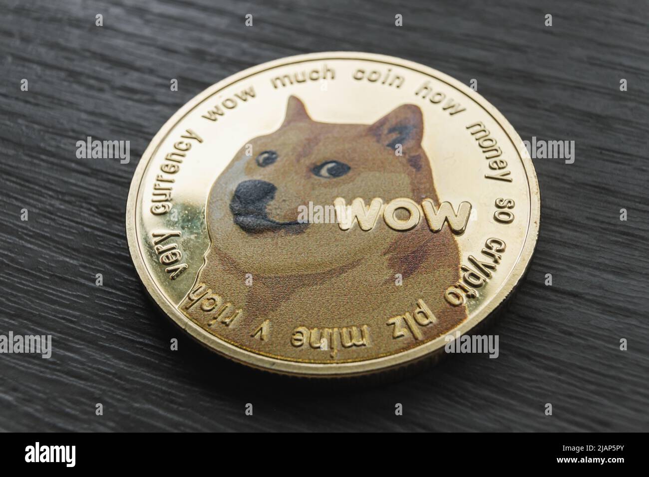 Close up photo of dogecoin crypto currency Stock Photo - Alamy