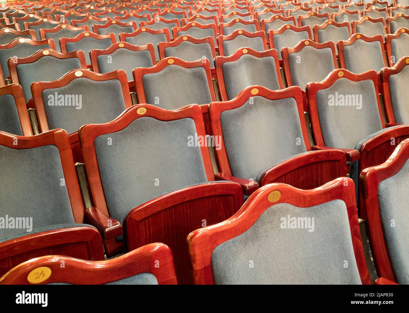 Rows of empty theatre chairs Stock Photo - Alamy