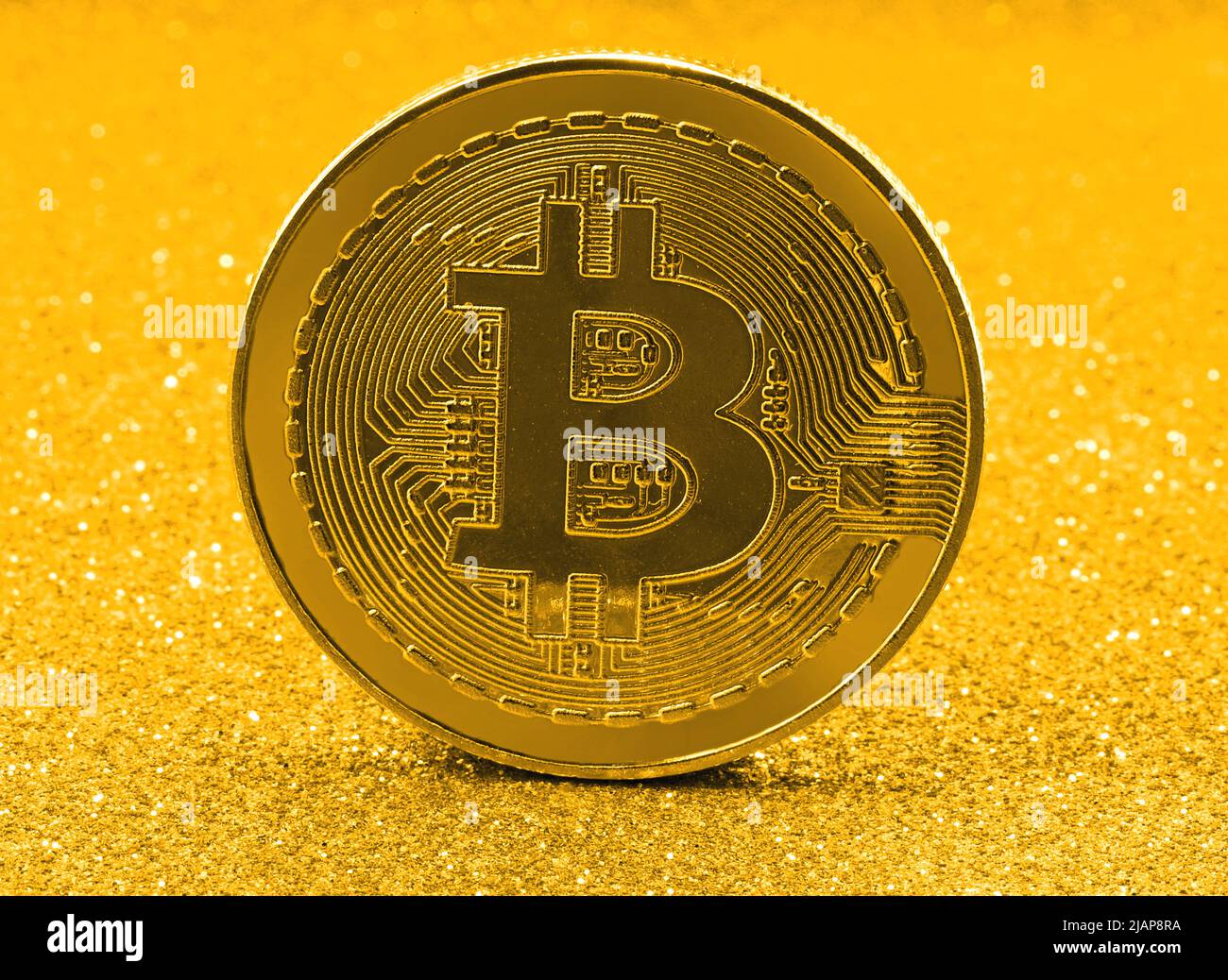 golden coin with the capital letter B which symbolizes the virtual ...
