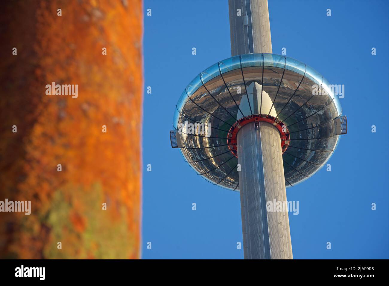 The i360 pod rising up its supporting tower, Brighton. Structural pylon ...