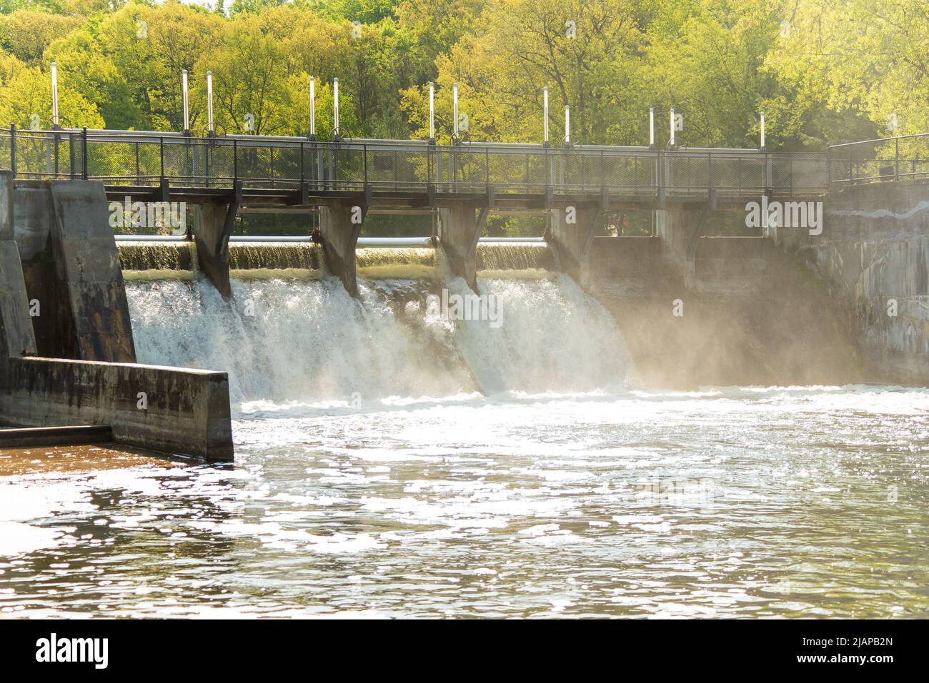 Water flowing through the Hamlin Lake Dam creating mist in Ludington ...
