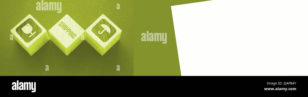 Shipping word and icons engraved on a wooden cubes, isolated on black ...