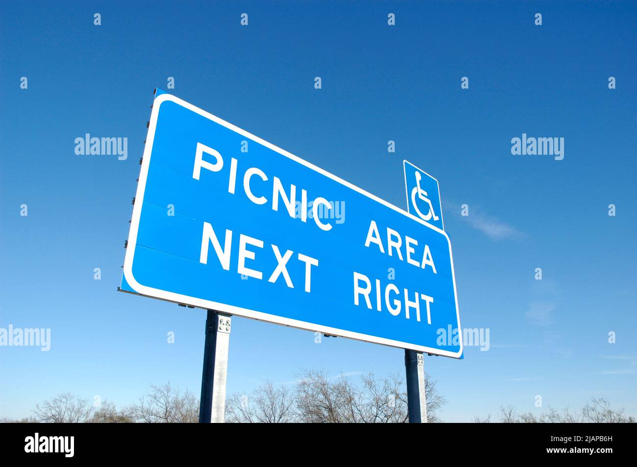Picnic sign sat off ramp on freeway with wheelchair accessible ...