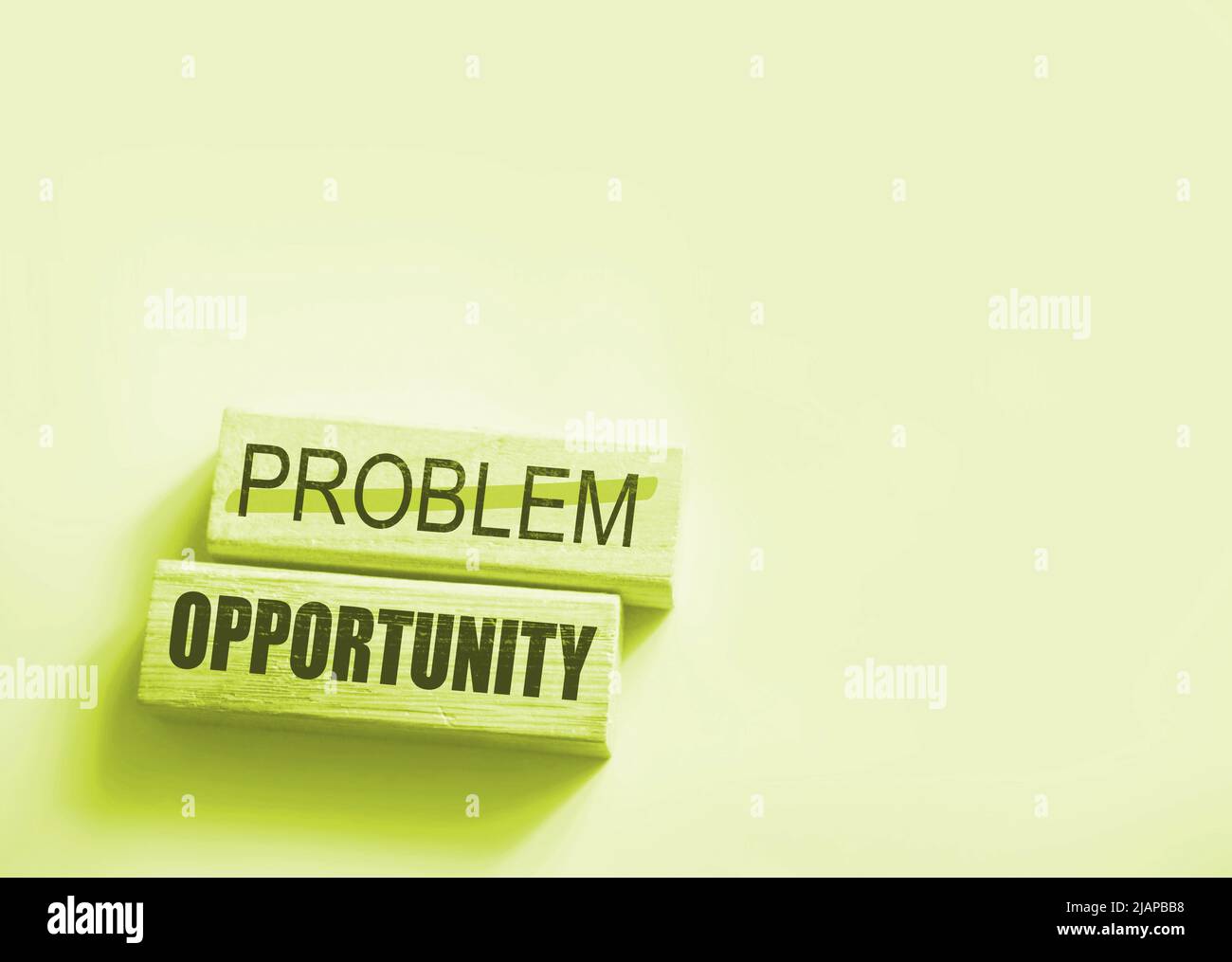 Problem crossed out and opportunity on wooden blocks. Business startup ...