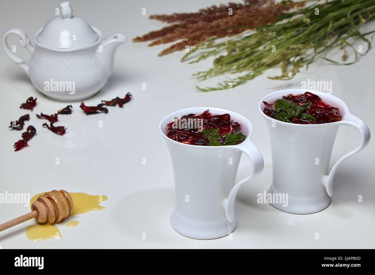 Hibiscus herbal tea made from Sudanese rose and mint flowers in elegant ...