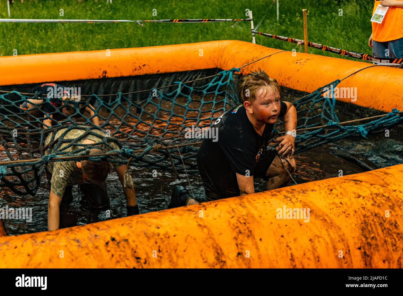 Poznan, Poland - June 2021: An hard extreme obstacle course Survival Race at rainy day Stock ...