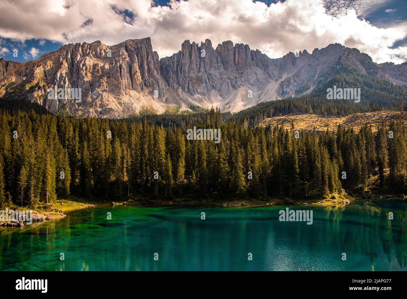 gorgeous ponds with crystalline colors (Carezza Lake - Dolomites Stock ...