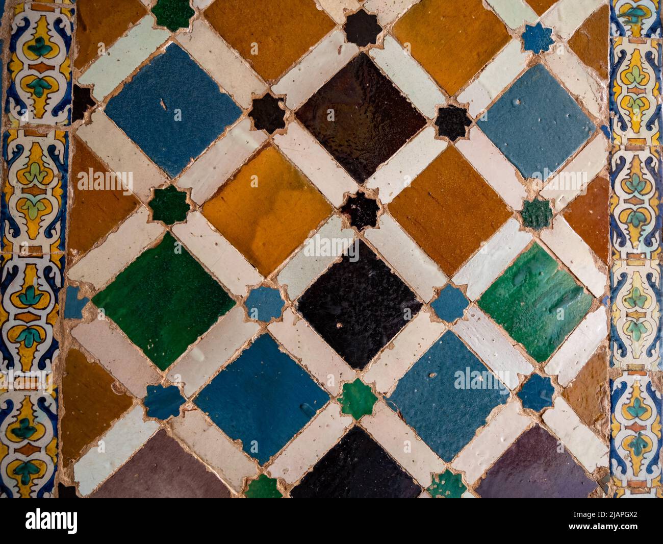 Ornamental medieval ceramic tiles of walls in Nasrid Palaces in the ...