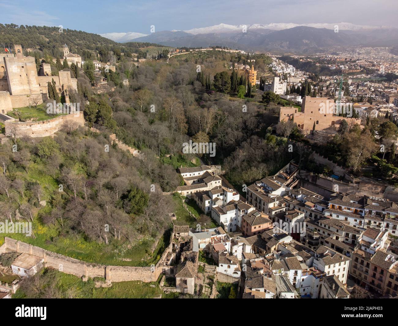 Aerial panoramic view on buildings, old district, mountains and ...