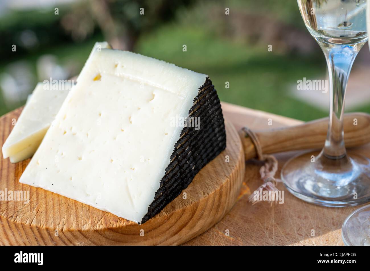 Spanish hard manchego, cow, sheep and goat cheese served outdoor in ...
