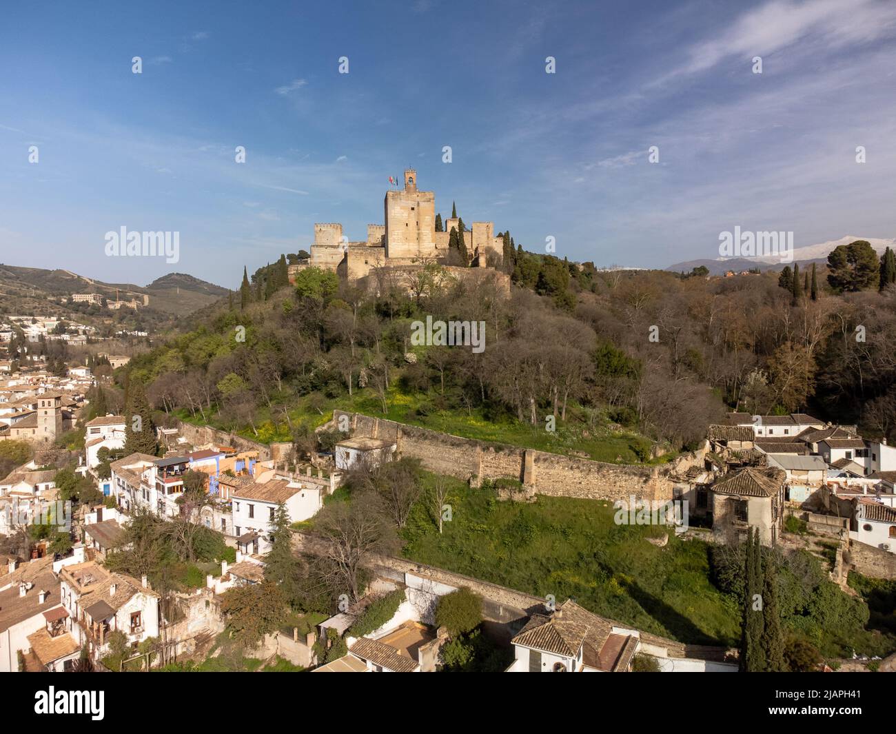 Aerial panoramic view on buildings, old district, mountains and ...