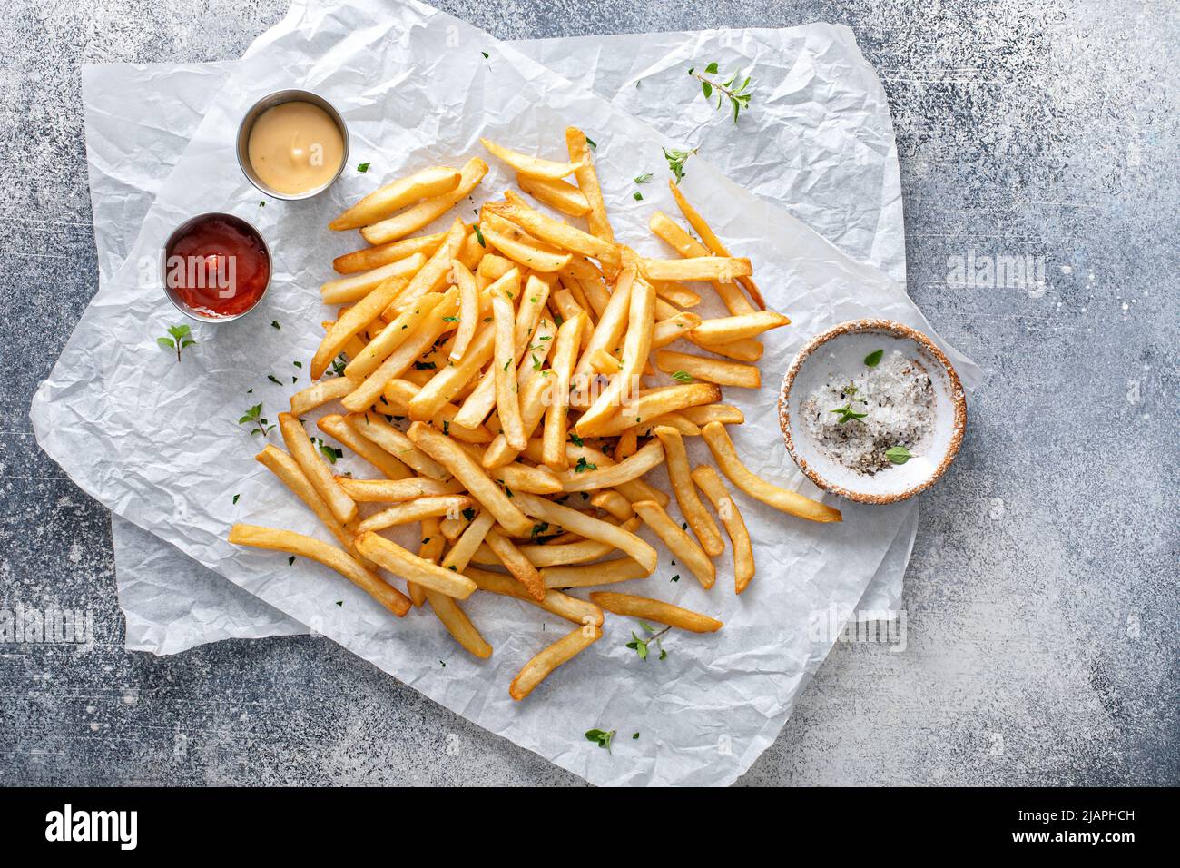 Traditional french fries with ketchup and honey mustard sauce Stock ...