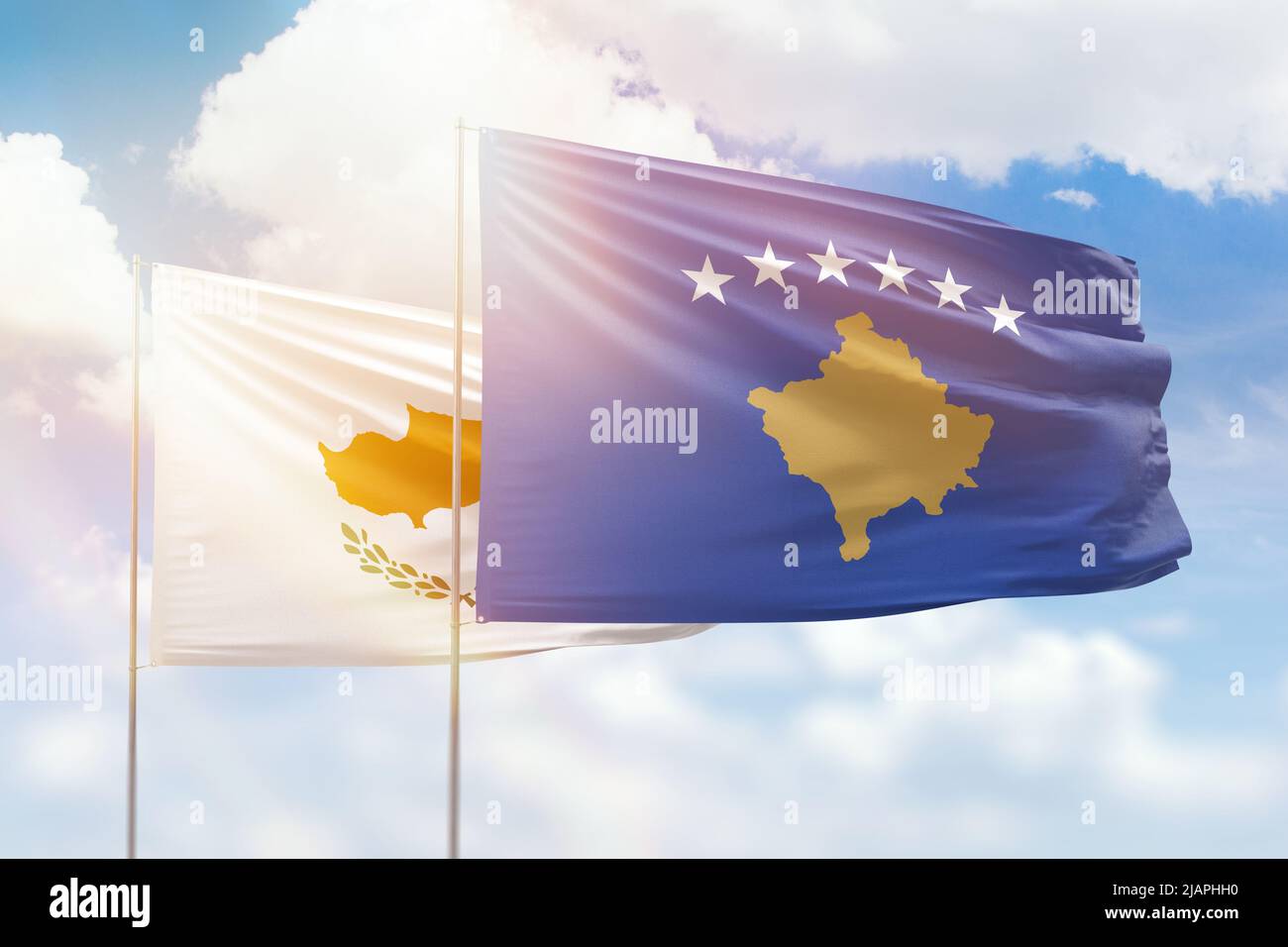 Sunny blue sky and flags of kosovo and cyprus Stock Photo - Alamy