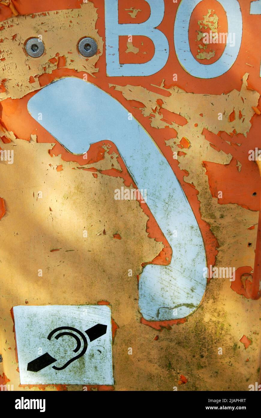 Old sign for a phone on Menai Bridge, UK Stock Photo - Alamy