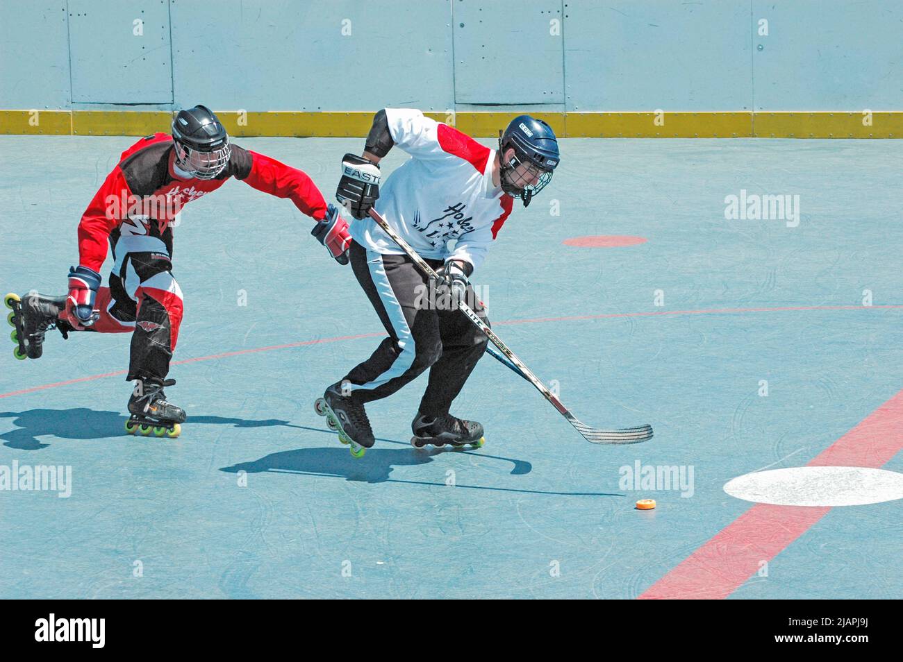 Game of Roller Hockey between local teams without Ice Hockey option during the summer Stock ...