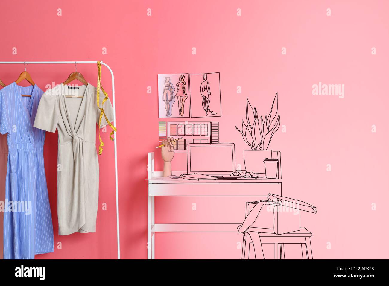 New interior of clothes stylist's office with workplace and rack with ...
