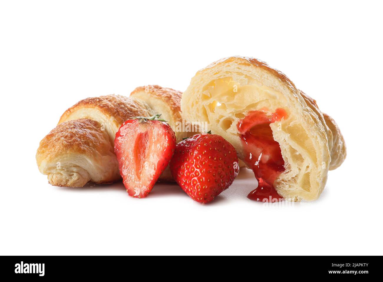 Delicious croissants with strawberry jam on white background Stock ...