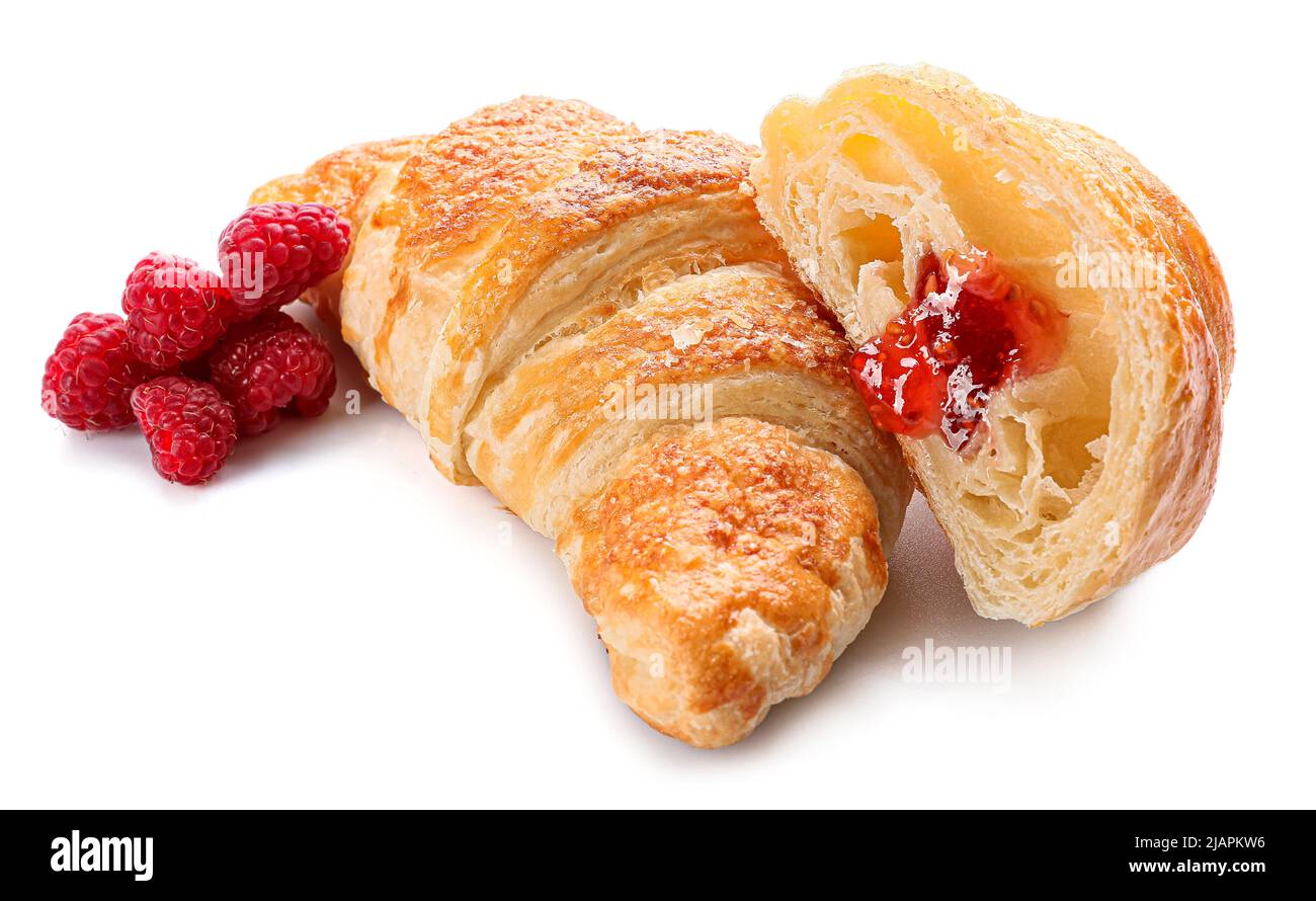 Delicious croissants with raspberry jam on white background Stock Photo ...