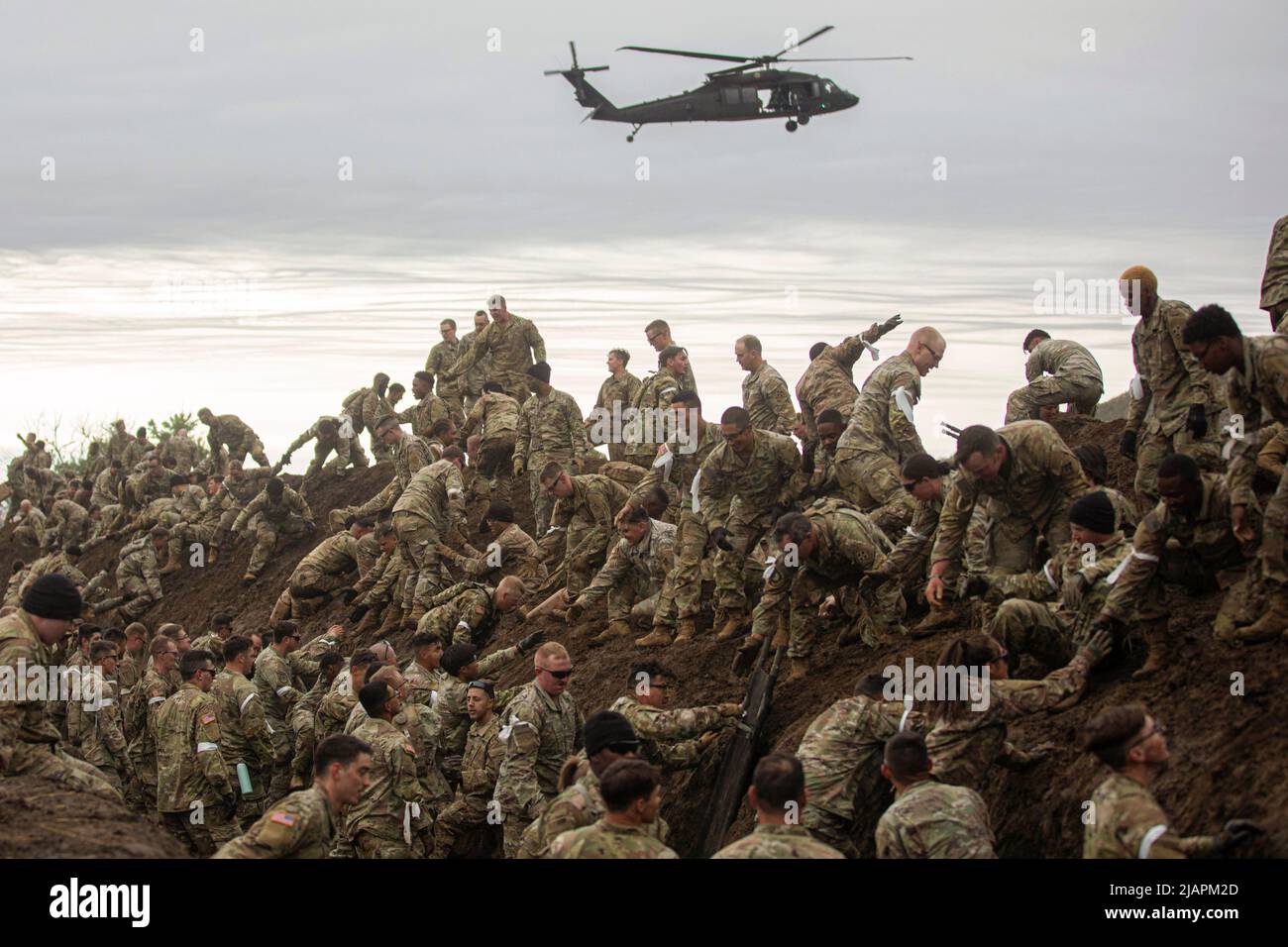 Fort Carson, Colorado, USA. 22nd May, 2022. Ivy Soldiers climb out of ...