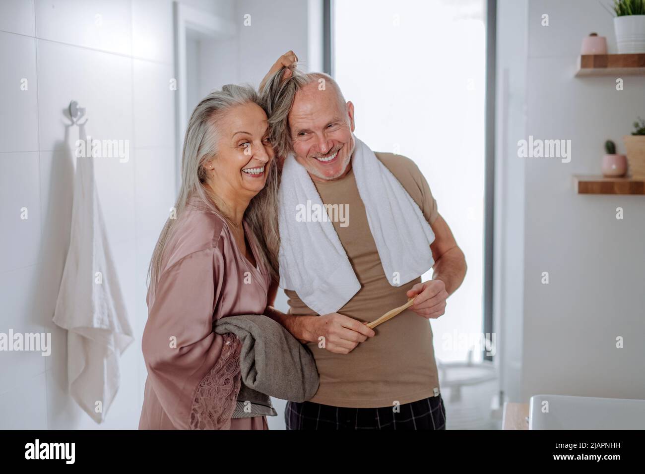 Mature woman hair brushing hi-res stock photography and images - Alamy