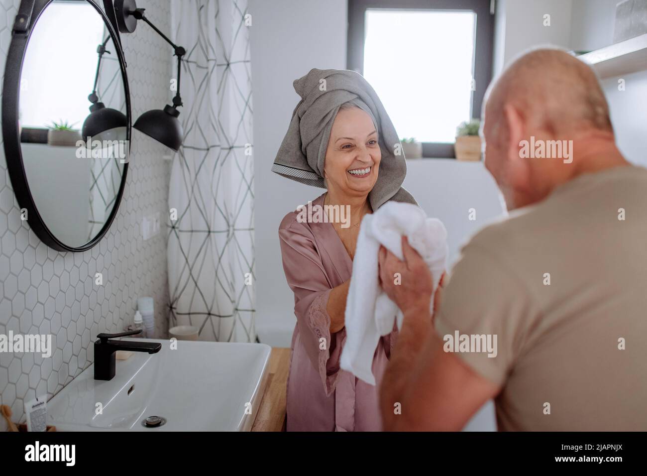 Mature woman hair brushing hi-res stock photography and images - Alamy