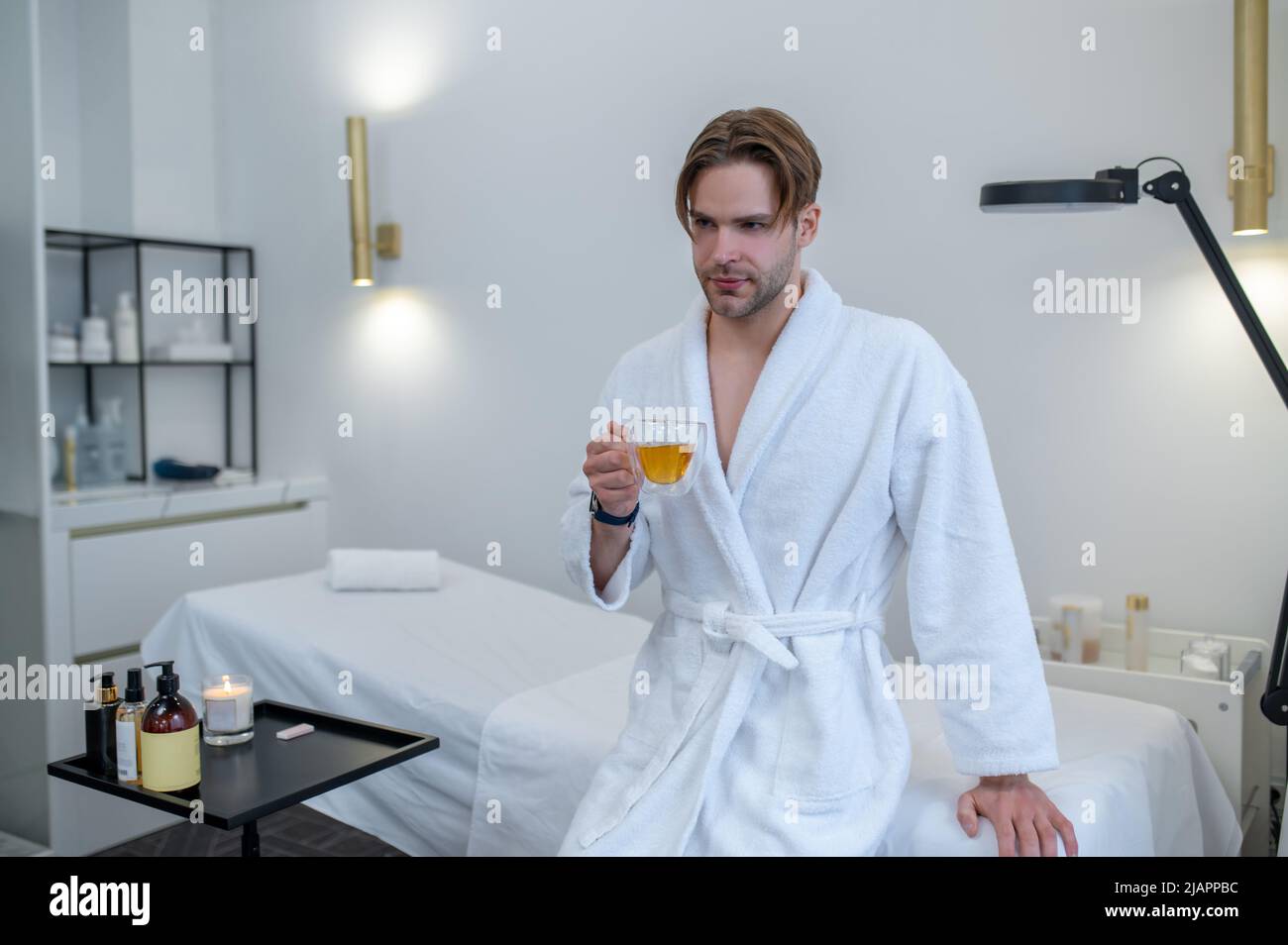 Man in a white robe hi-res stock photography and images - Alamy