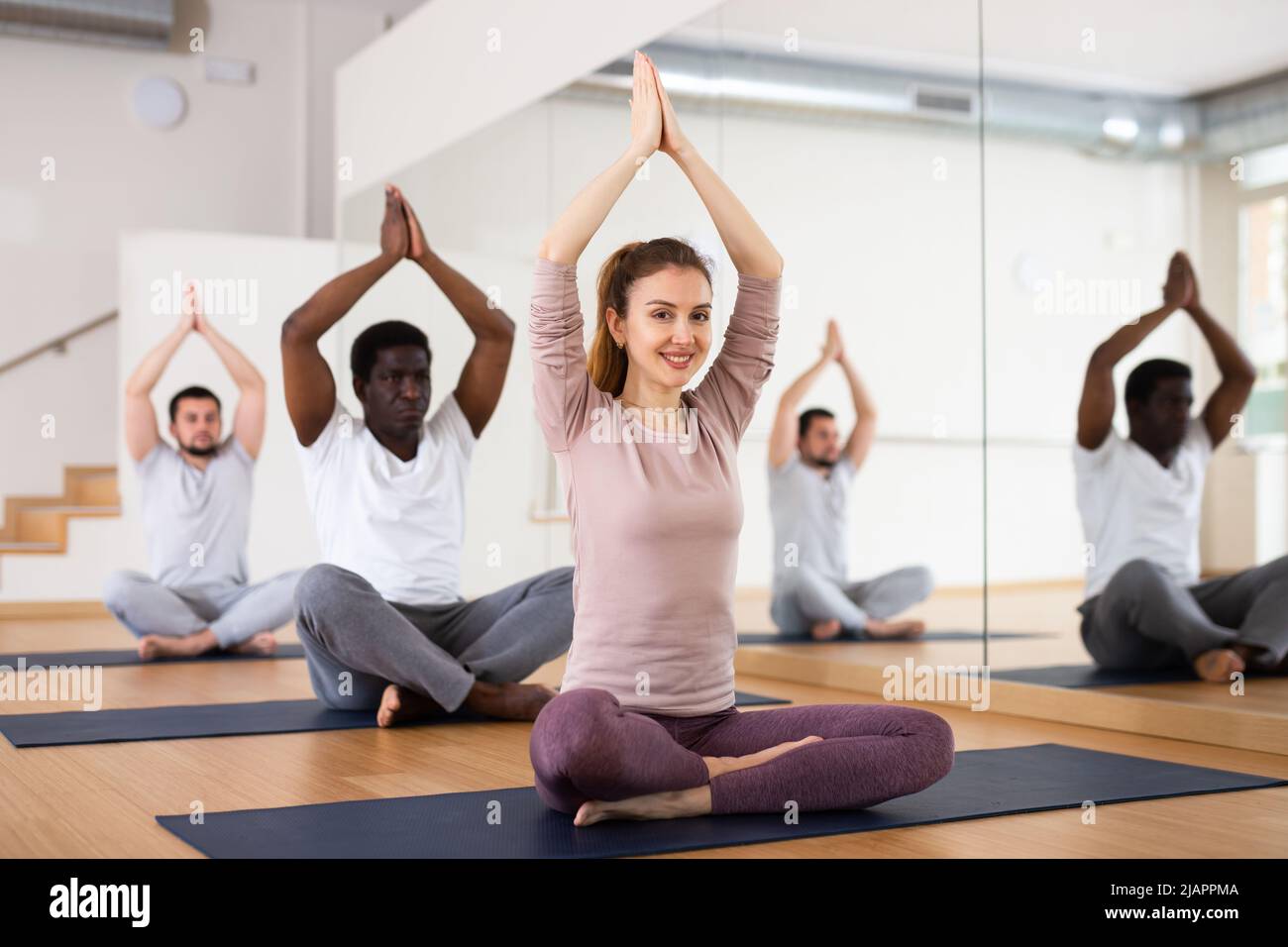 Woman yoga arms above head hi-res stock photography and images - Alamy