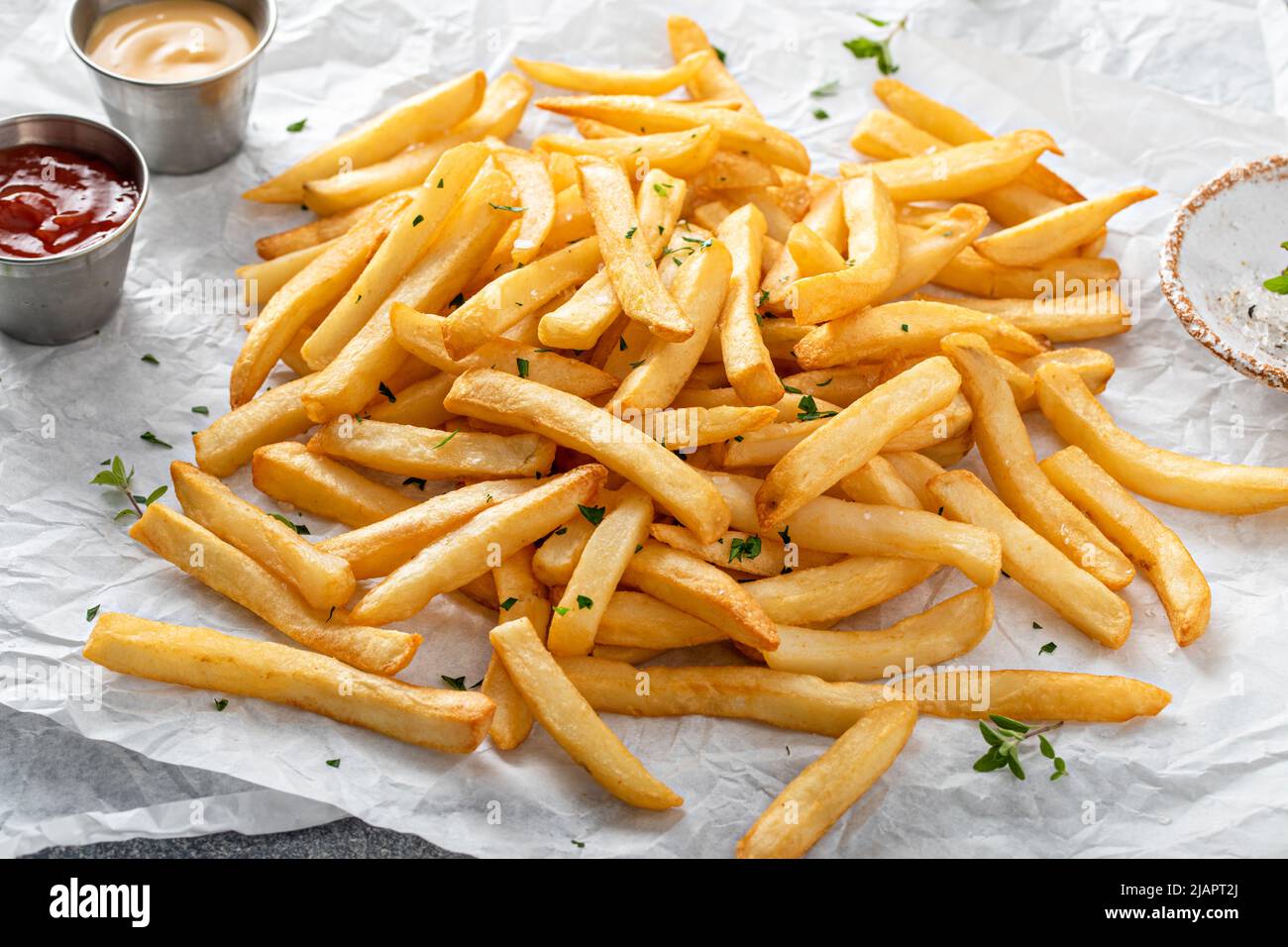 Traditional french fries with ketchup and honey mustard sauce Stock ...
