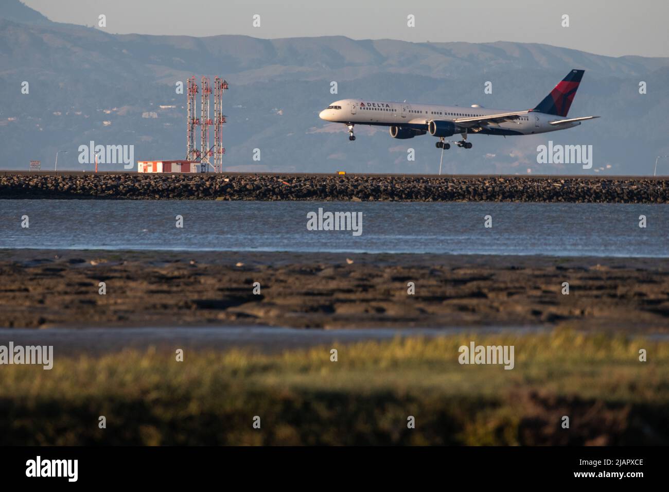 Airplane landing international coastal airport hi-res stock photography ...